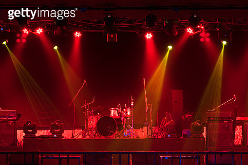 Musical instruments with spotlight on the stage with light ray in ...