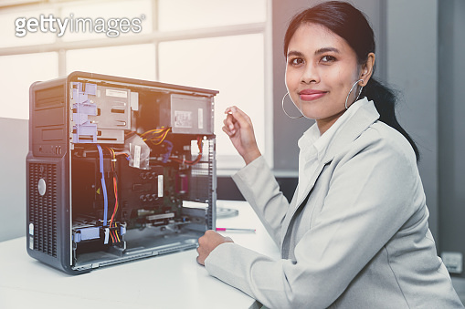 IT women staff officer work in office computer hardware fix repair ...