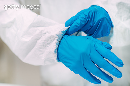 Woman Putting Protective Splash Face Shield On. Laboratory Safety ...