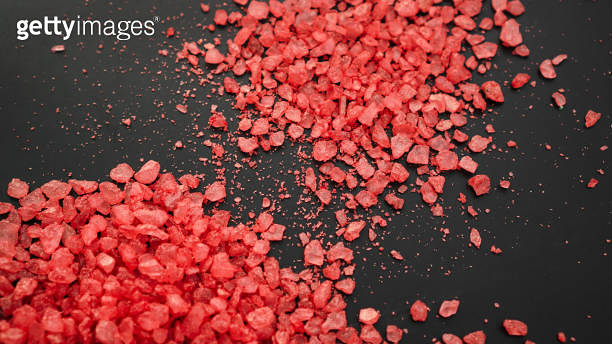 Salt isolated on a black background. A pile of red salt. Large ...