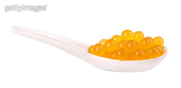 Yellow tapioca pearls for bubble tea isolated on white background ...