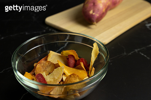 Tuber Chips. Sweet potato and manioc (Cassava) chips in a bowl ...