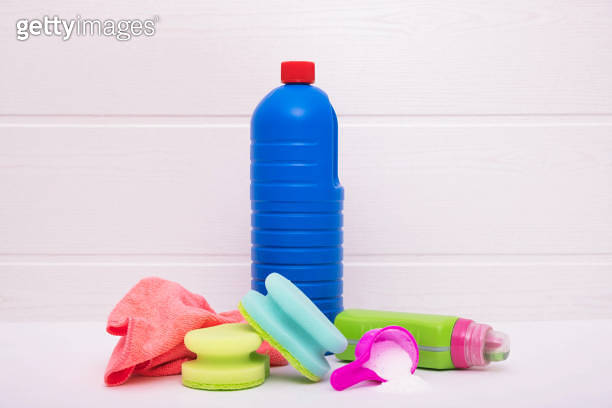 rag and sponges, scattered powder and liquids for cleaning and ...