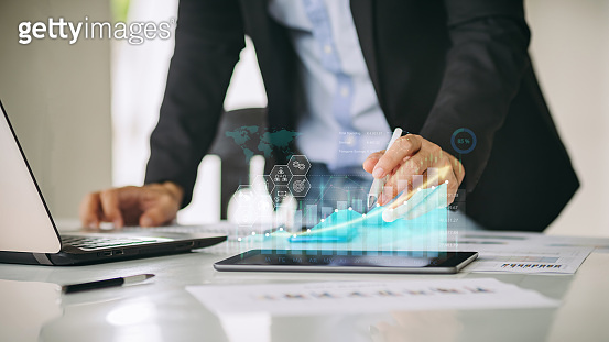 Businessman work with ai for economy analysis financial result by ...