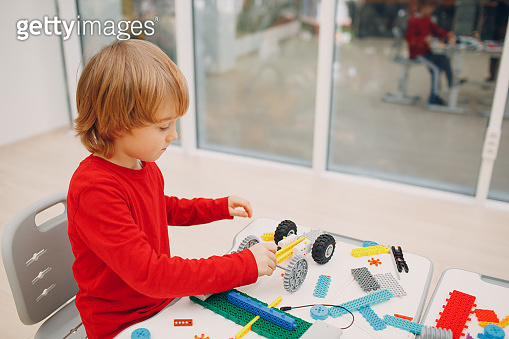 Little boy kid child constructor checking technical toy. Children ...