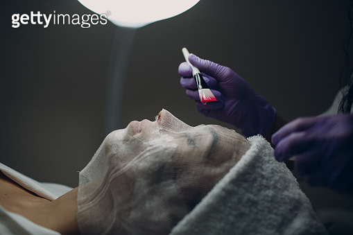 Paraffin Face Mask gauze bandage Therapy Young Woman Receiving Facial ...