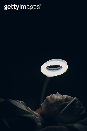 Paraffin Face Mask gauze bandage Therapy Young Woman Receiving Facial ...