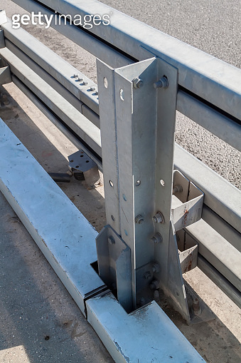 metal roadside fence support with connecting elements and bolts with ...