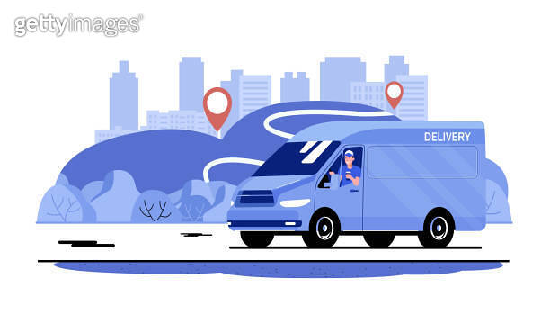 Cargo van with driver on the road against the backdrop of a rural ...