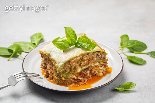 Homemade oven-baked green lasagna - Lasagne alla bolognese with spinach ...