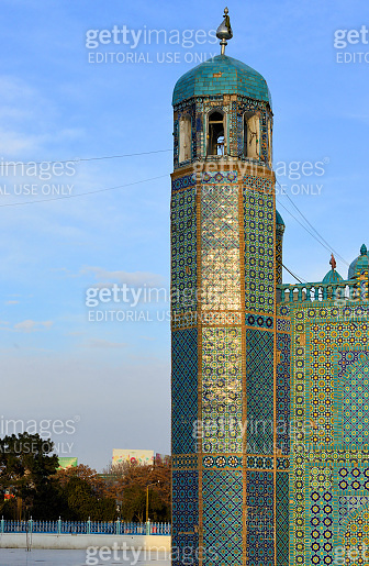 Shrine of Ali (Hazrat Ali Mazar) - minaret with Persian tiles at the ...
