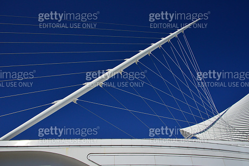 Cables and mast of the Reiman Pedestrian Bridge and Milwaukee Art ...