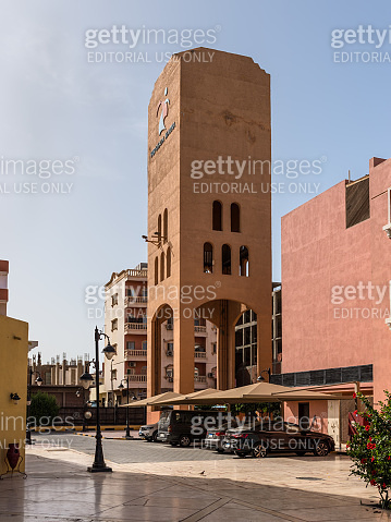 Street view of New Marina boulevard with a high tower in Hurghada ...