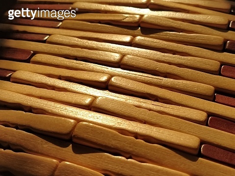 reed or wood mat. The rug is a mat under the hot. Knitted processed ...