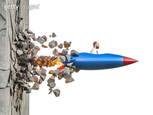 man on rocket destroying a concrete wall. 이미지 (1314542083) - 게티이미지뱅크