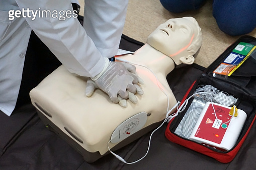 Chest compressions by a student on a simulation dummy during basic life ...