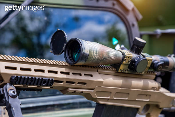 Sniper rifle with a telescopic sight for long range shooting in war ...