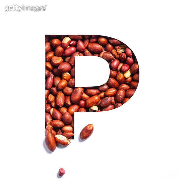 Letter P of alphabet made of nuts and paper cut isolated on white ...