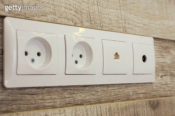 Power outlet including electric socket, antenna socket, switches with a ...