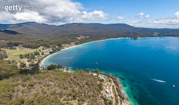 Stunning high angle aerial drone view of Adventure Bay on the eastern ...