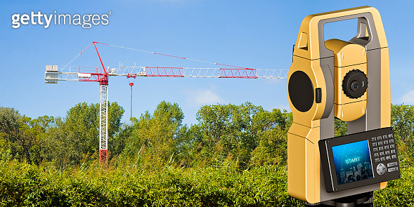 Red and white tower crane surrounded by nature and 3D rendering of a ...