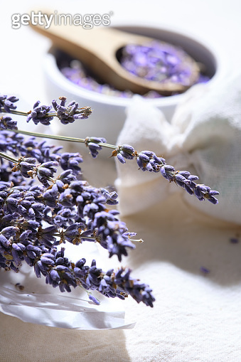 Close-up on dry lavender flowers in white tracing paper. Hand made ...