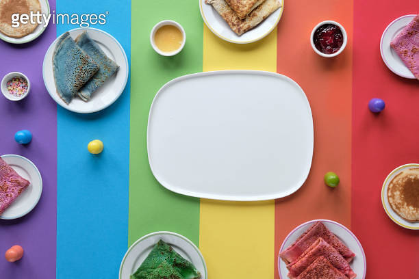 Rainbow pancakes, different color crepes. Spinach, beetroot powder ...