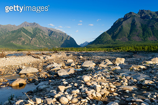 he beautiful valley of the Middle Sakukan river against the backdrop of ...