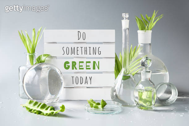 Green laboratory. Text Do Something Green Today on white pallet. Exotic ...
