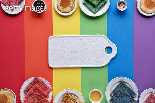 Rainbow pancakes, different color crepes. Spinach, beetroot powder ...