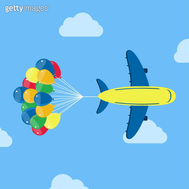 Plane flying with a group of helium balloons in the back. (1346283453 ...
