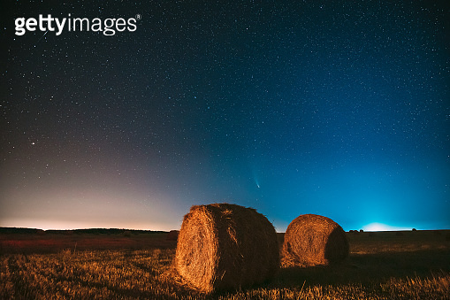 Comet Neowise C2020 F3 In Night Starry Sky Above Haystacks In Summer ...