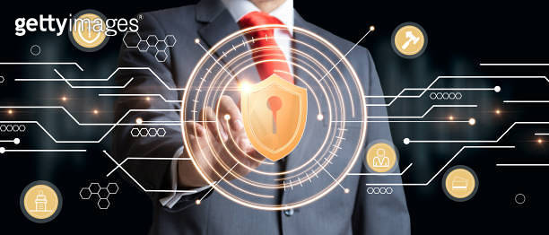 Businessman touching the security symbol as a concept of security of ...
