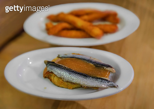 Spanish pintxos anchovies with foie gras in San Sebastian, Basque ...