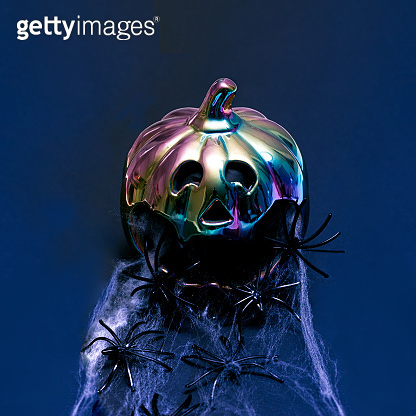 Halloween pumpkin scary minimal cyberpunk arrangement. Spiders crawling ...