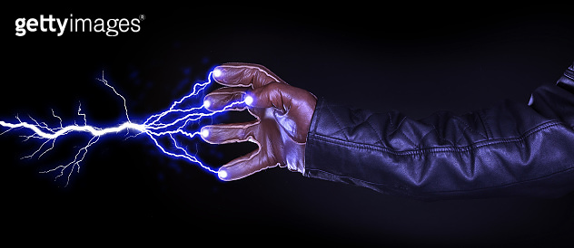 Hand shooting out a bolt of lightning - Dark and mysterious, isolated ...