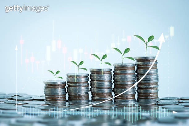 Stacking money coins for growing growth financial and business. Savings ...