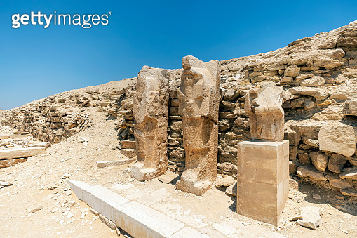 Large blocks and fragments of an Egyptian temple. egyptian statues of ...
