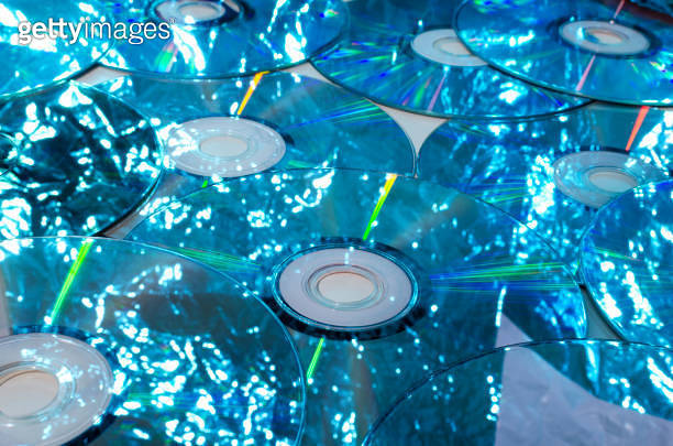 Closeup of shiny blue compact discs as a abstract background 이미지 ...