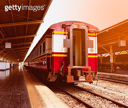 closeup vintage iron train on steel track in train station under ...