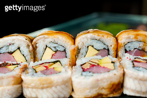 Unagi rolls with tuna, tobiko caviar, cheddar cheese, nori, unagi sauce ...