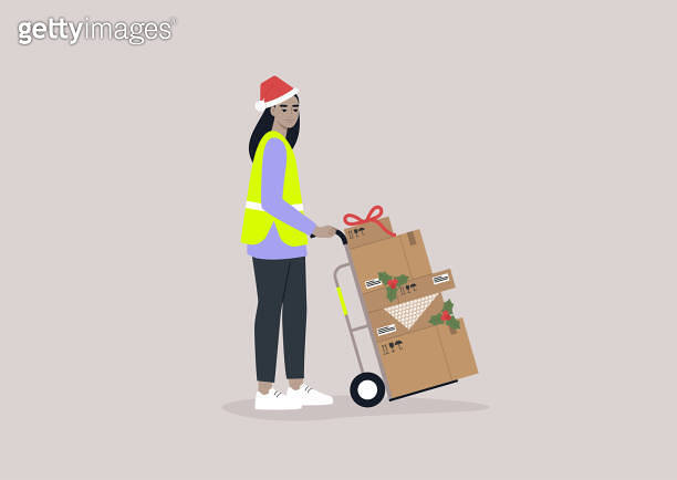 Christmas presents delivery, a young female Asian storage worker ...