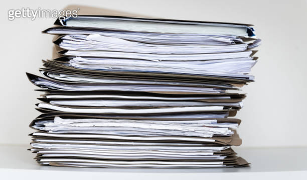 Extremely Close up Stack of Documents Folders on Office Desk Waiting to ...