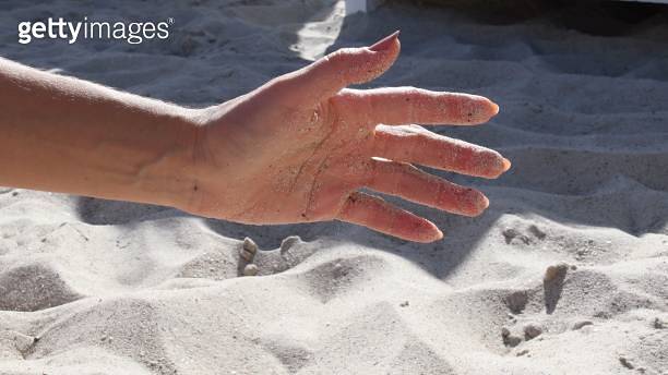 Female hand palm skin covering by beach sand grains 이미지 (1338200940 ...