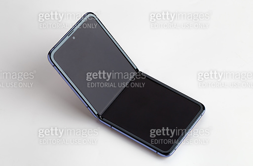 Samsung Galaxy Z Flip on a white background. New smartphone with a ...