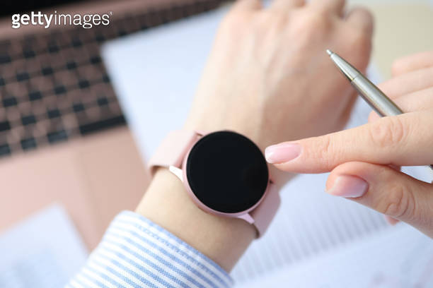 Woman pointing with index finger to clock face closeup 이미지 (1300115081 ...