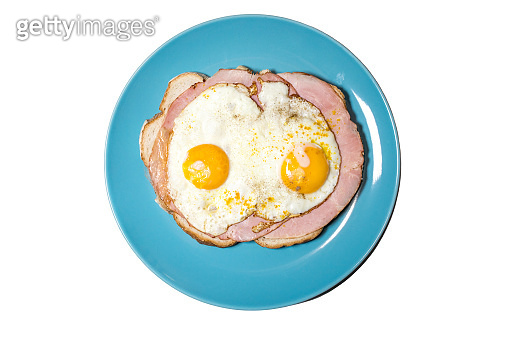 Top view of meat sandwich with fried egg. Yellow egg yolk. Dutch lunch ...