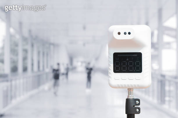 temperature thermometer in hall or shopping mall store indoor blur ...