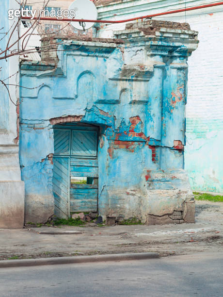 Ancient ruined blue building. Destroyed cyan house. Travel street photo ...