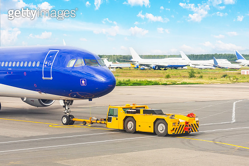 Performing towing and starting of aircraft engines, against the ...